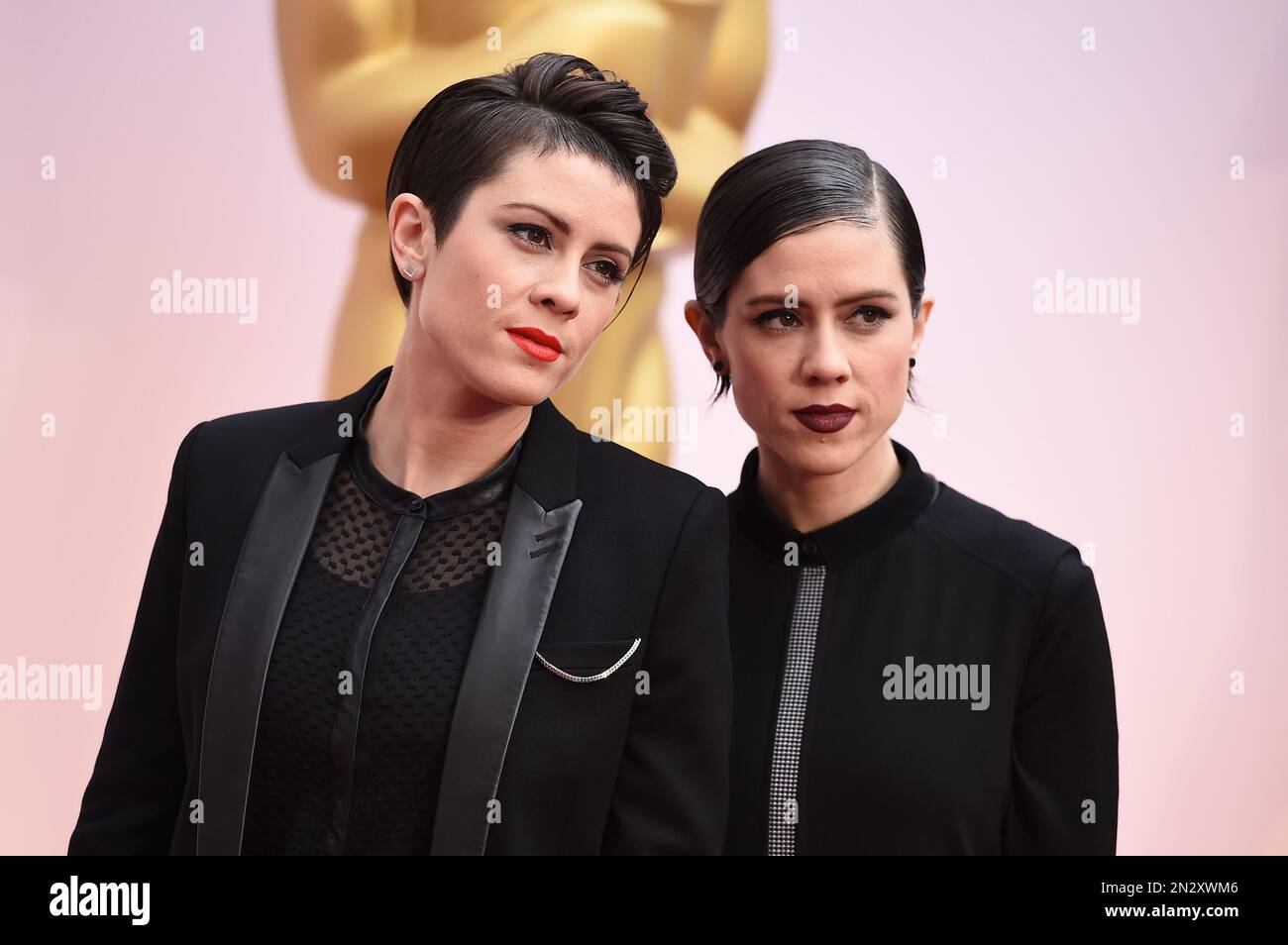 Tegan Quin, left, and Sara Quin arrive at the Oscars on Sunday, Feb. 22 ...