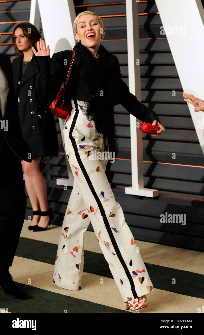Miley Cyrus arrives at the 2015 Vanity Fair Oscar Party on Sunday, Feb ...