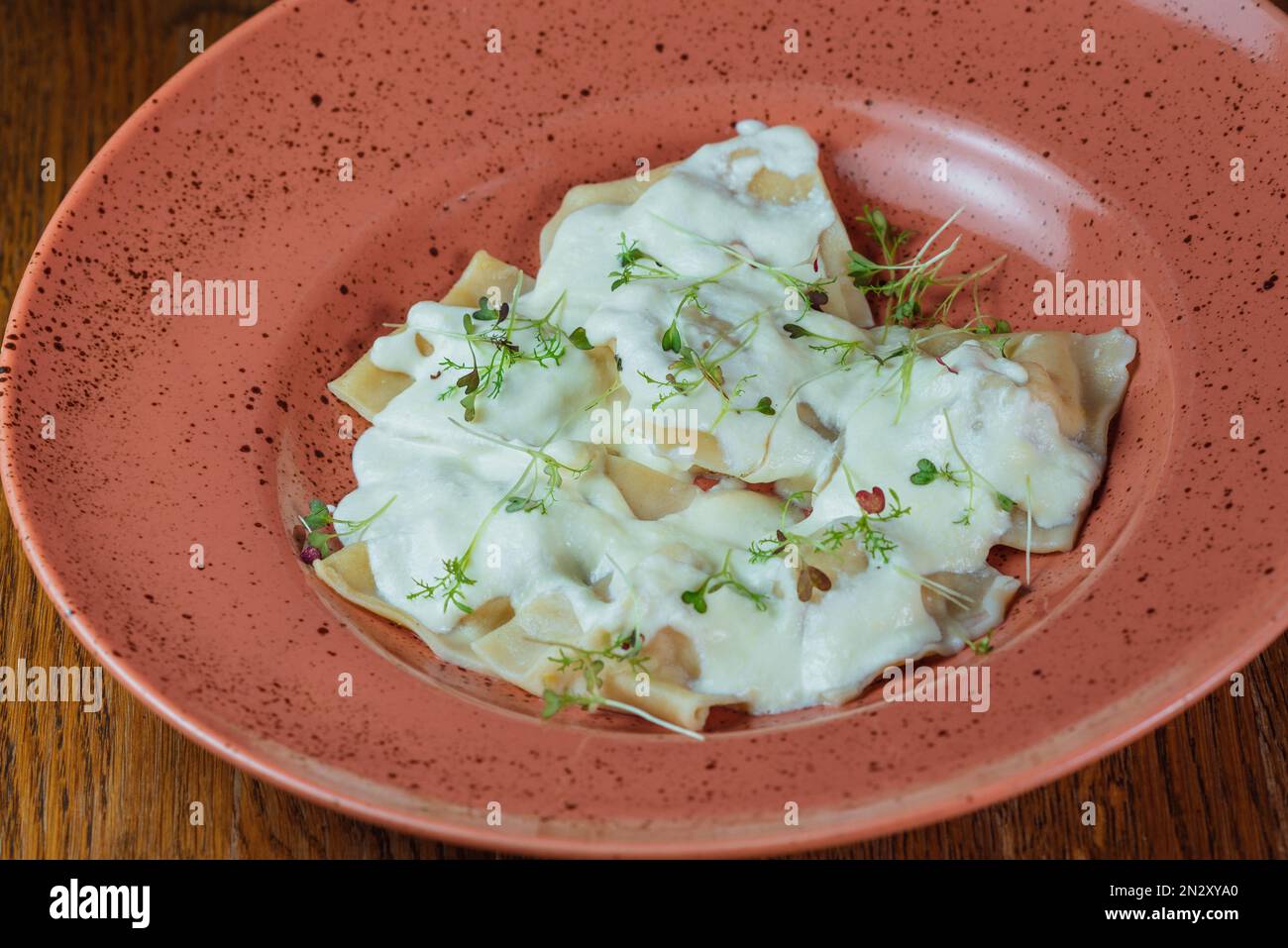 Dishes from the chef of the restaurant. A dish on a table in a cafe ...