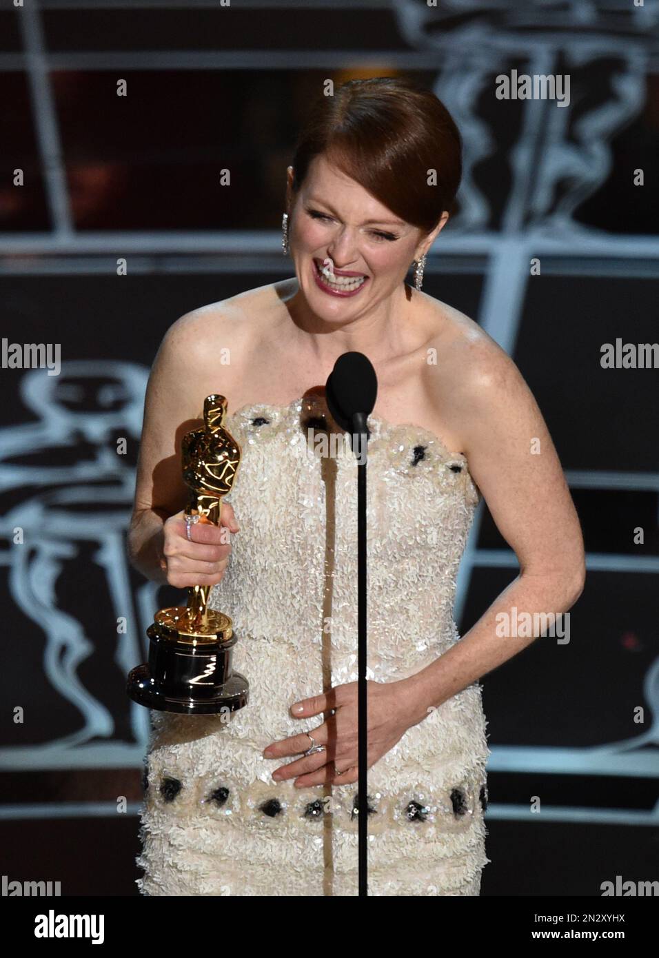 Julianne Moore accepts the award for best actress in a leading role for ...