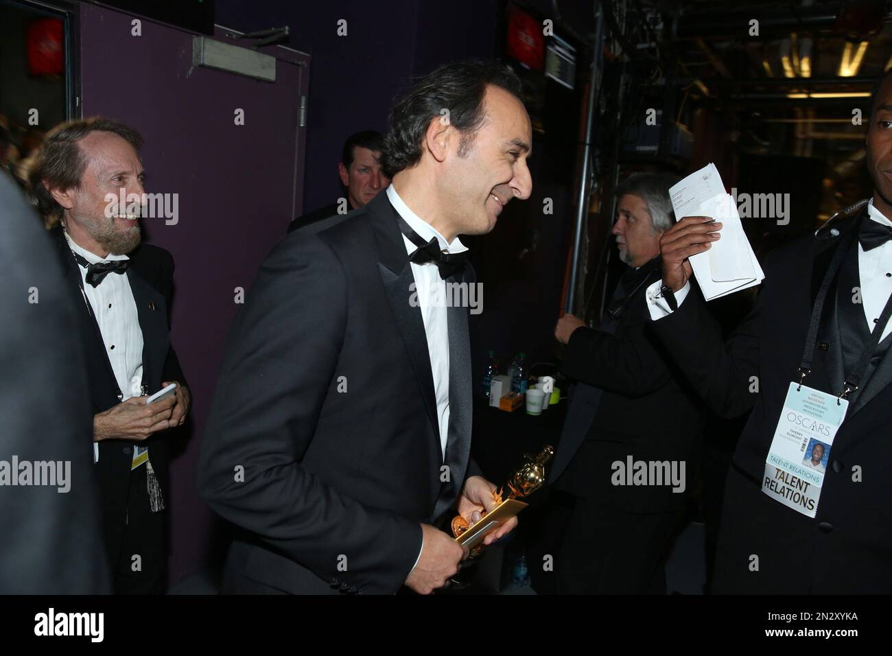 Alexandre Desplat is seen backstage with the award for best original ...