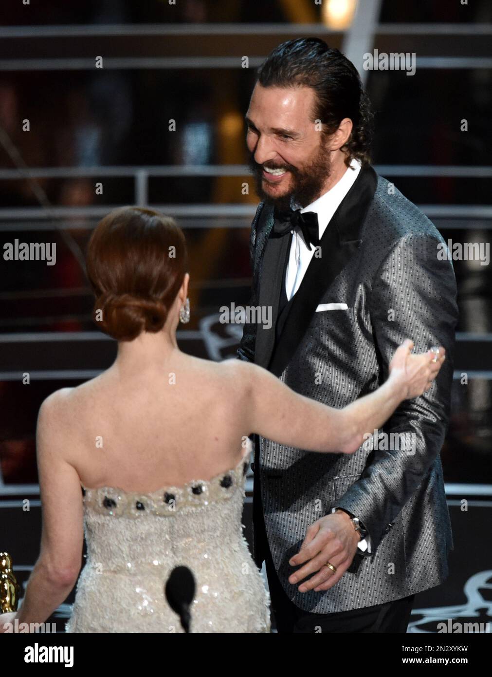 Matthew Mcconaughey, right, presents Julianne Moore with the award for ...