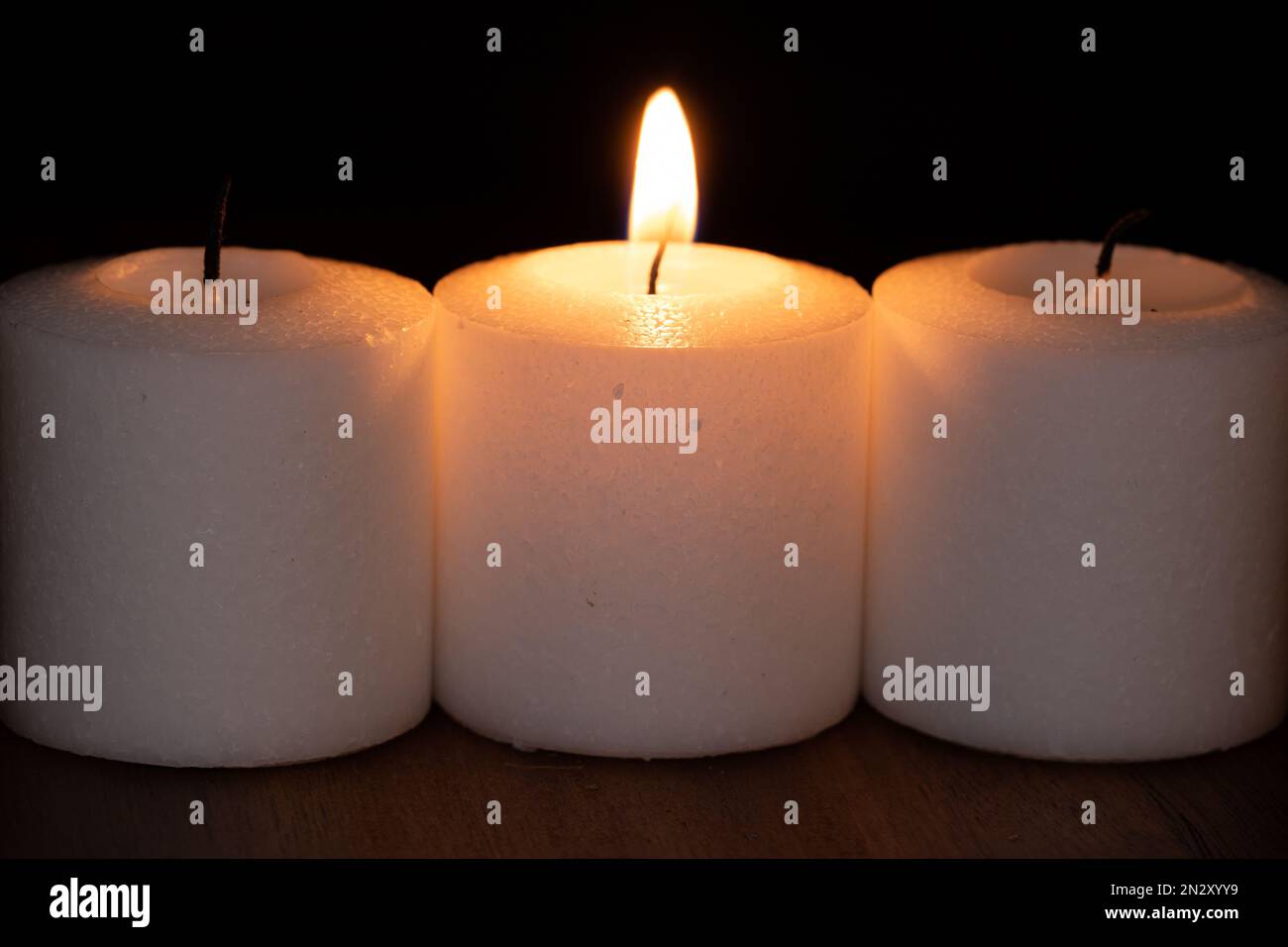 Lit candles and unlit candles hi-res stock photography and images - Alamy