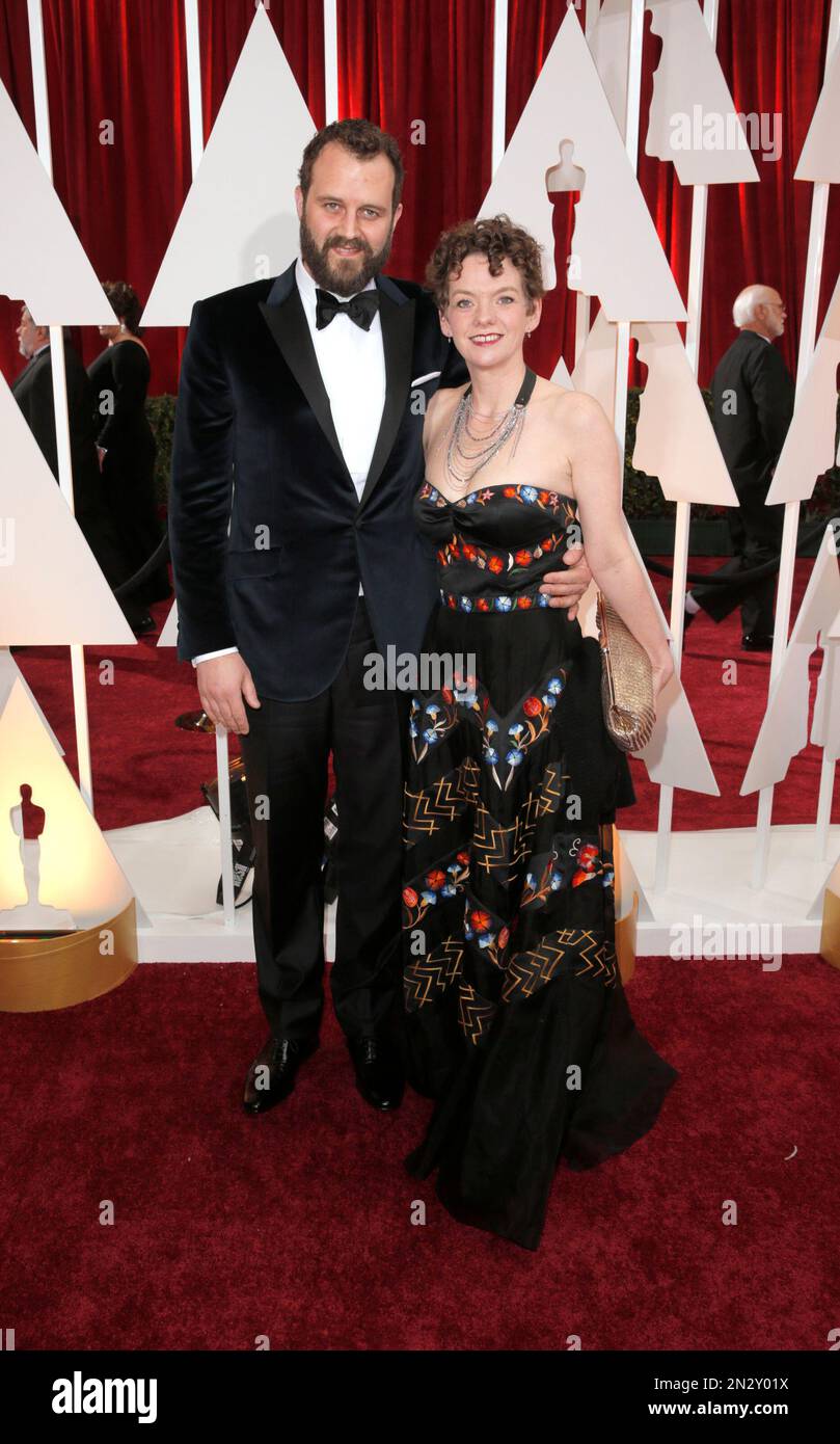 Barney Pilling, left, and guest arrive at the Oscars on Sunday, Feb. 22 ...