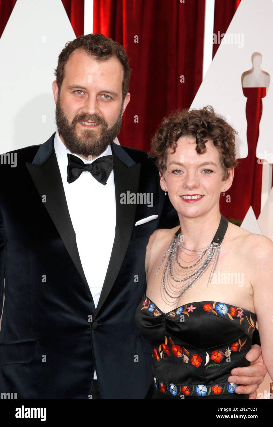 Barney Pilling, left, and guest arrive at the Oscars on Sunday, Feb. 22 ...