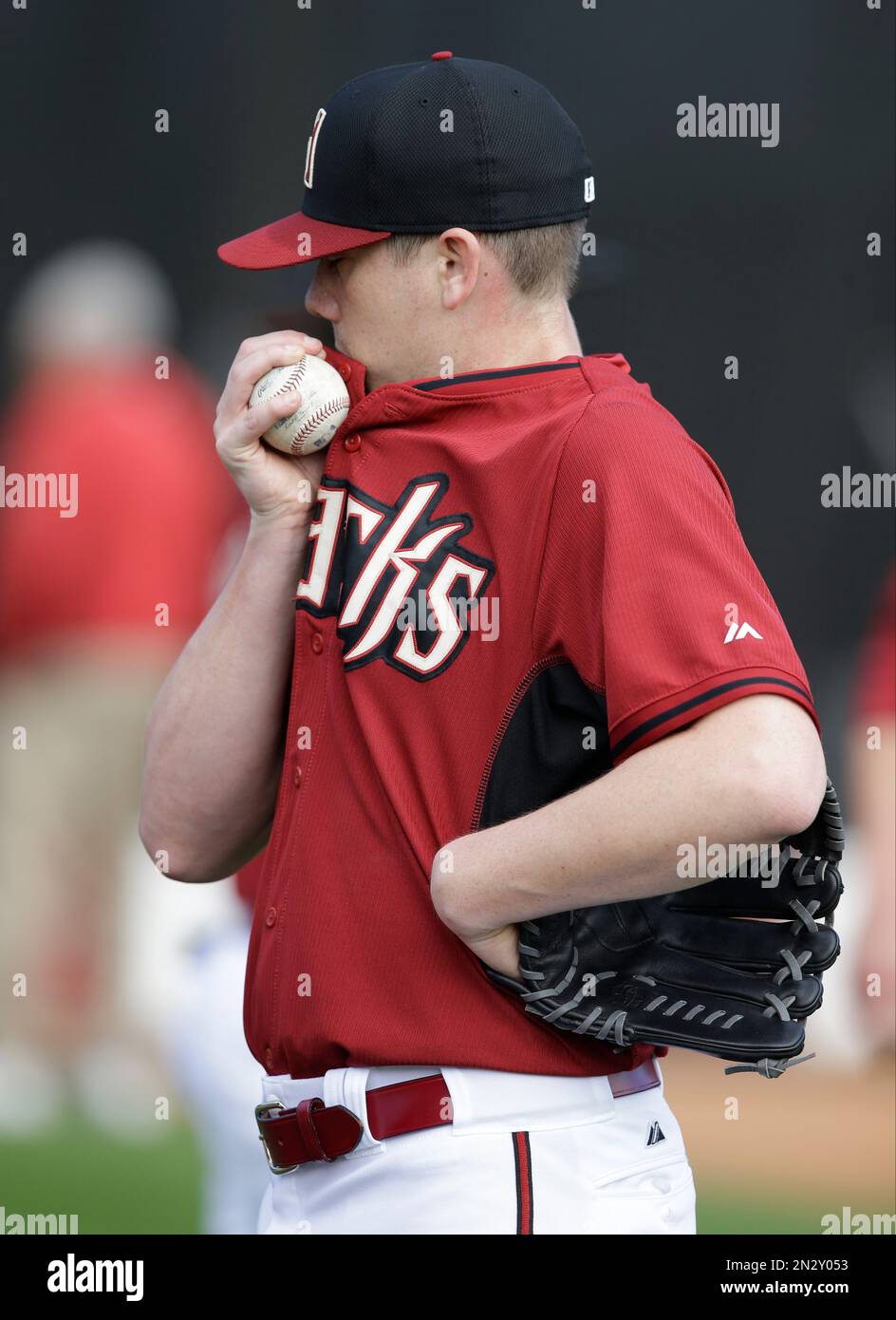 Arizona Diamondbacks' Jeremy Hellickson (58) tosses the baseball after throwing during spring ...