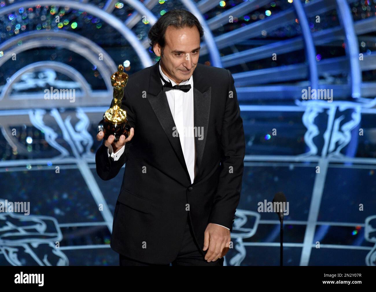 Alexandre Desplat accepts the award for original score in a feature ...