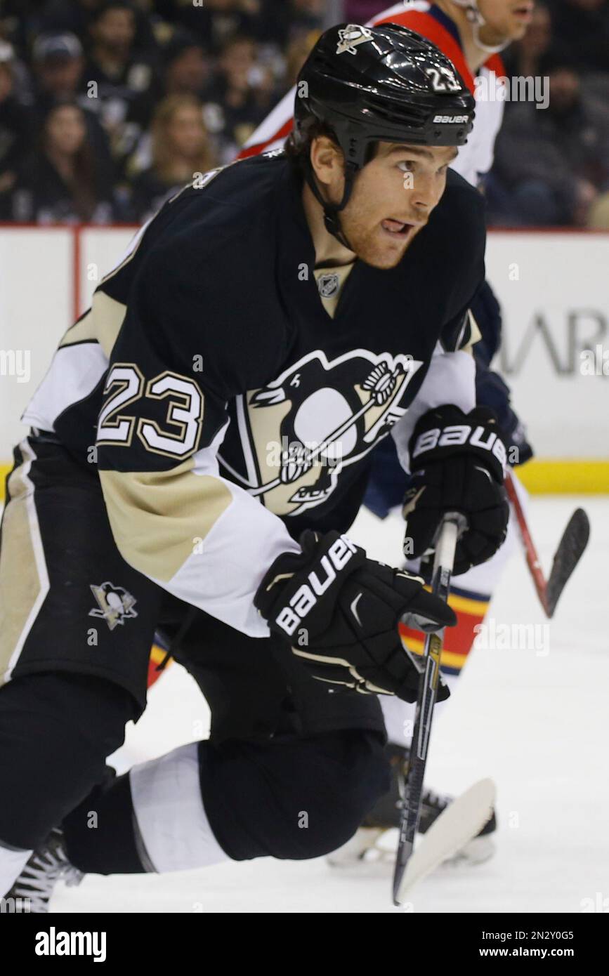 Pittsburgh Penguins' Steve Downie (23)plays in an NHL hockey game ...
