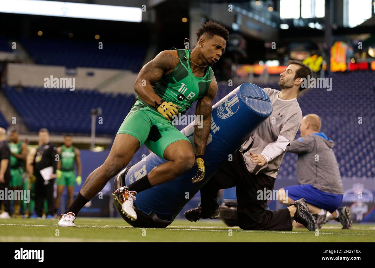 LSU linebacker Kwon Alexander runs a drill at the NFL football scouting ...