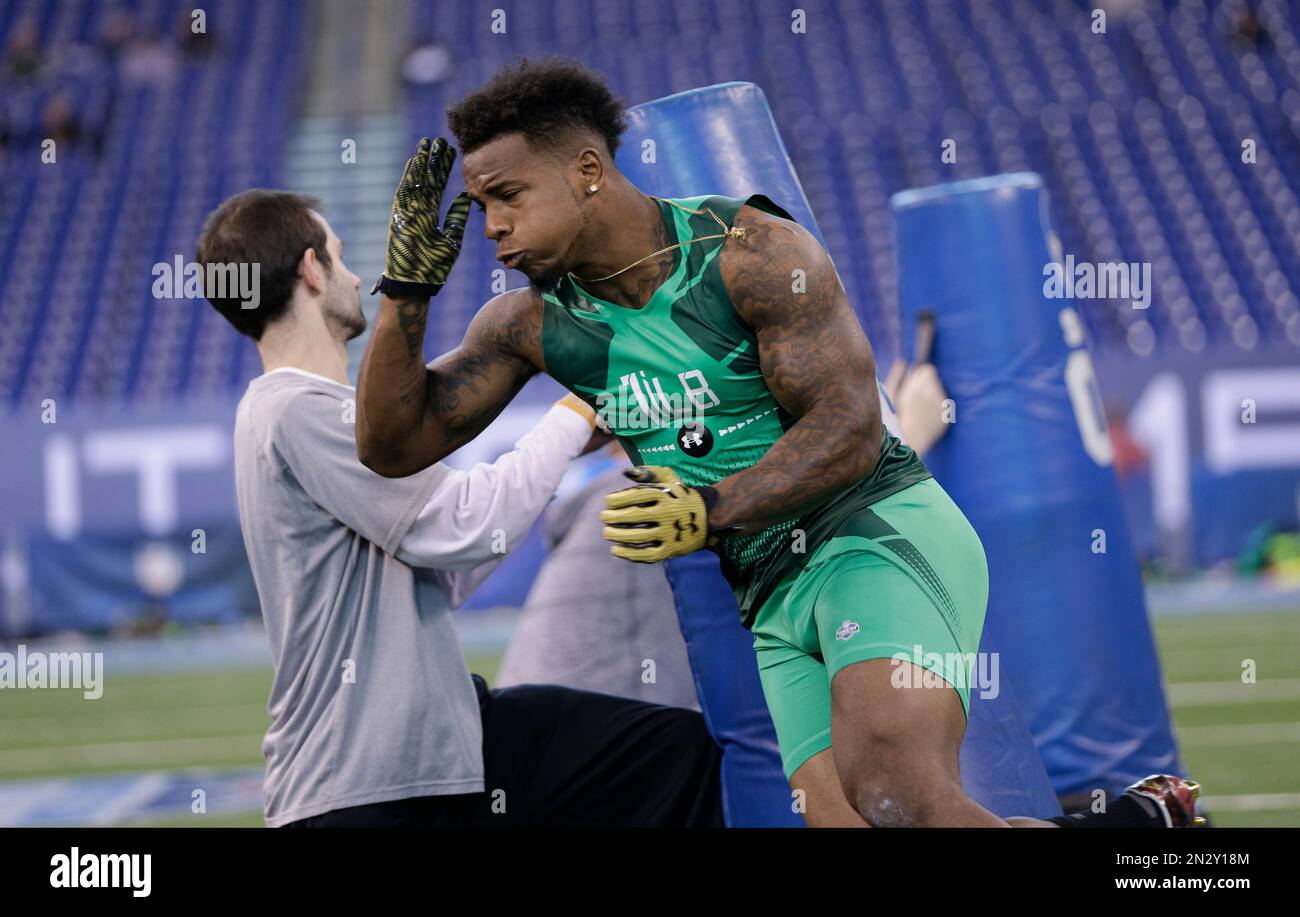 LSU linebacker Kwon Alexander runs a drill at the NFL football scouting ...