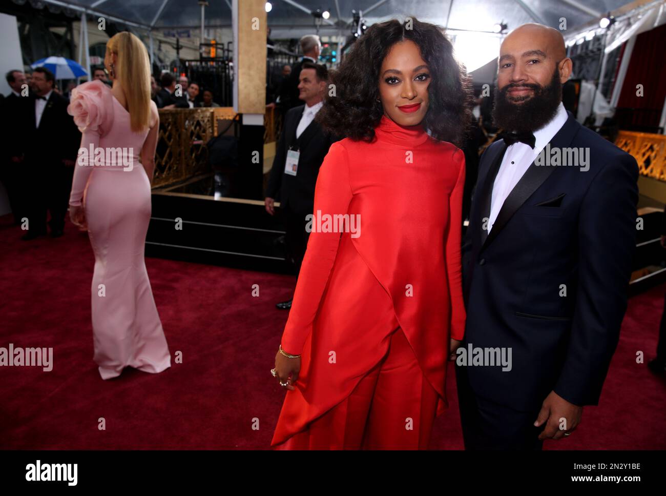 Solange Knowles, left, and Alan Ferguson arrive at the Oscars on Sunday ...