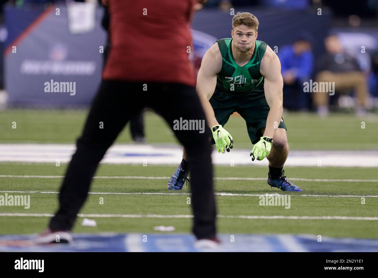 Michigan linebacker Jake Ryan runs a drill at the NFL football scouting ...