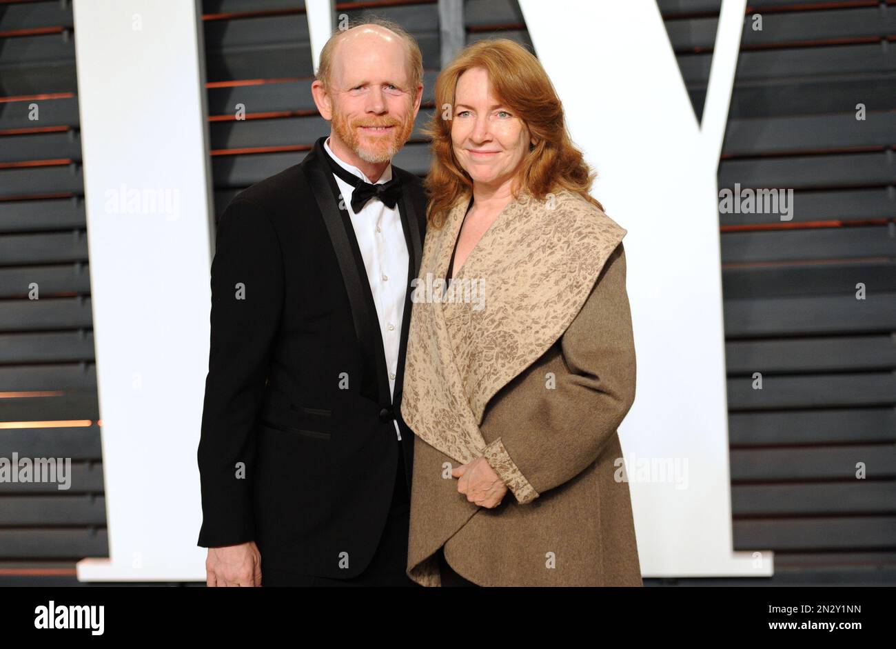 Ron Howard, left, and Cheryl Howard arrive at the 2015 Vanity Fair ...