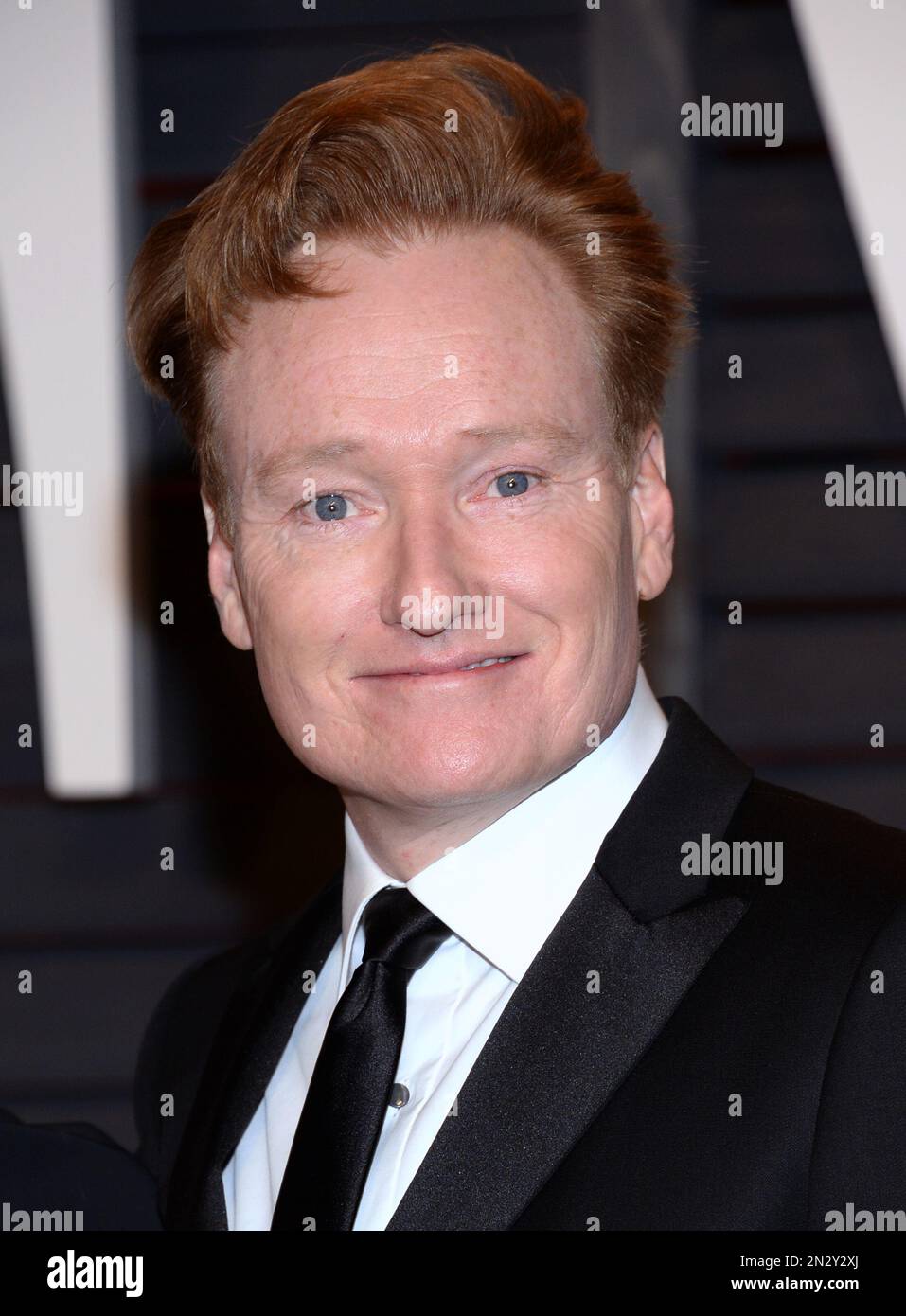 Conan O' Brein arrives at the 2015 Vanity Fair Oscar Party on Sunday ...