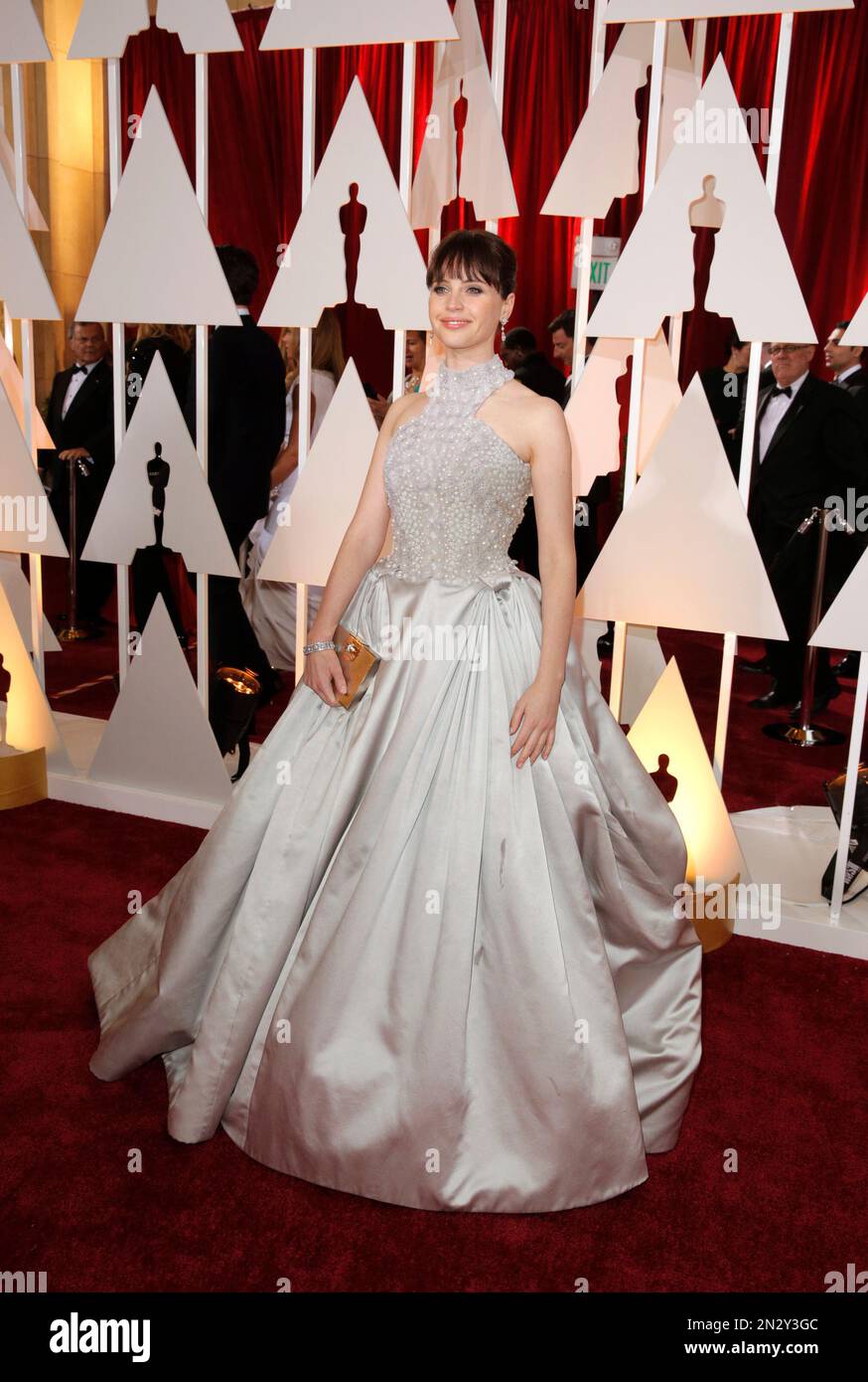 Felicity Jones arrives at the Oscars on Sunday, Feb. 22, 2015, at the ...