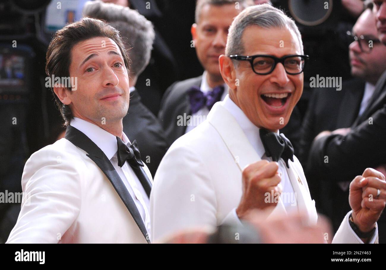Adrien Brody, left, and Jeff Goldblum arrive at the Oscars on Sunday ...