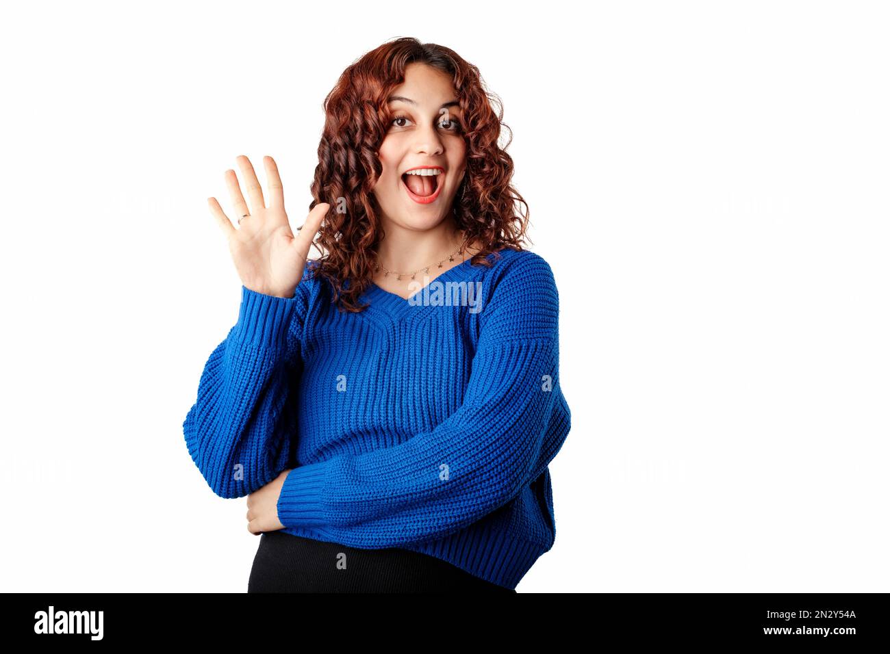 Happy woman wearing pullover sweater standing isolated over white ...