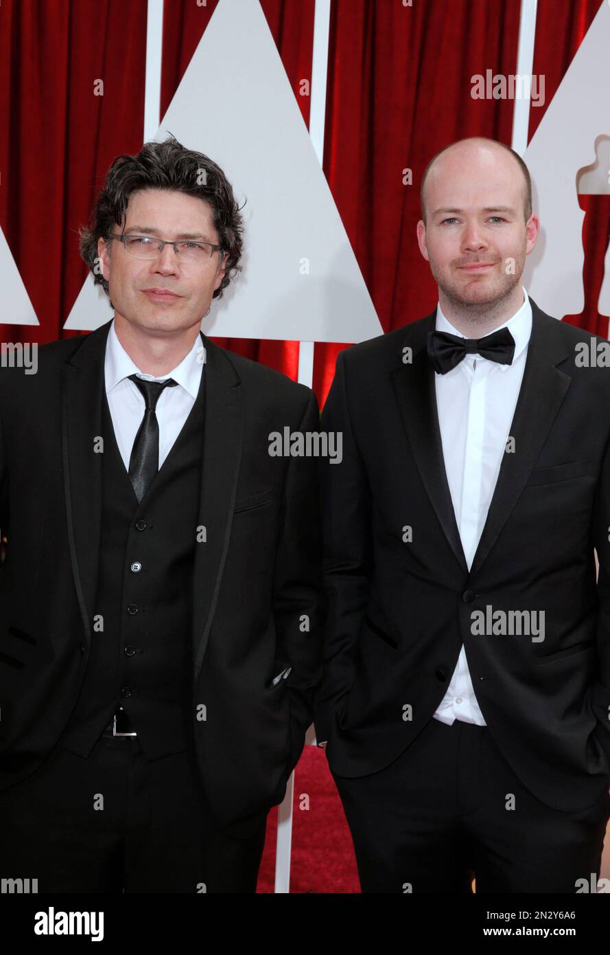 Michael Lennox, left and Ronan Blaney arrive at the Oscars on Sunday ...