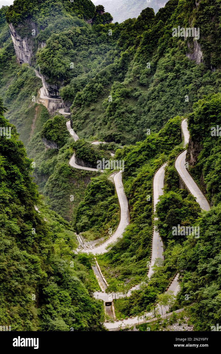 The curvy road leading to the cave at Tianmen Mountain. There are 99 ...