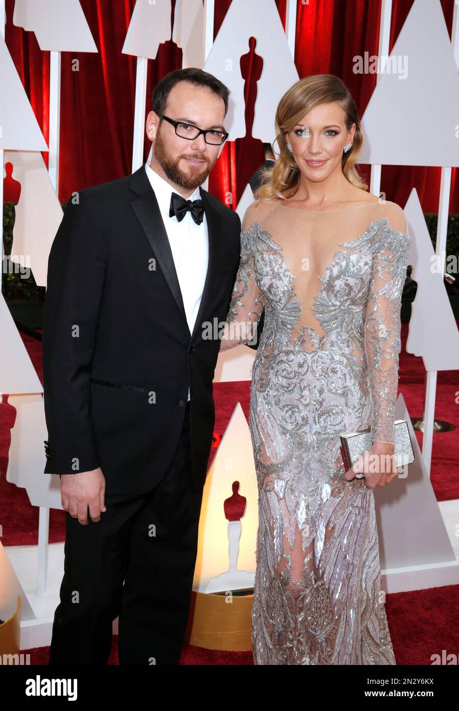 Dana Brunetti, left, and Katie Cassidy arrive at the Oscars on Sunday ...