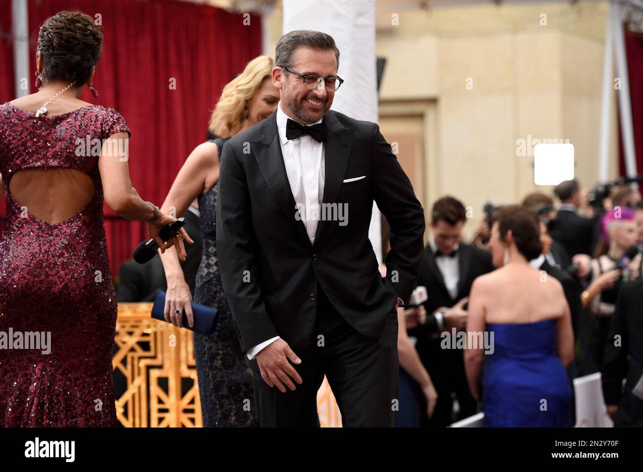 Robin Roberts, and from left, Nancy Carell and Steve Carell arrive at ...
