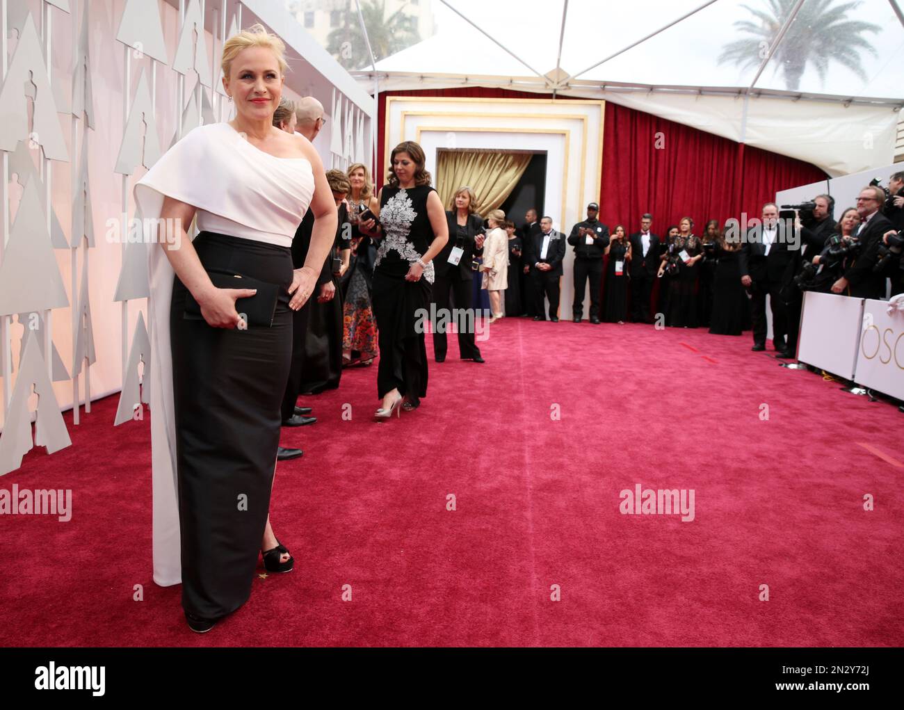 Patricia Arquette arrives at the Oscars on Sunday, Feb. 22, 2015, at ...