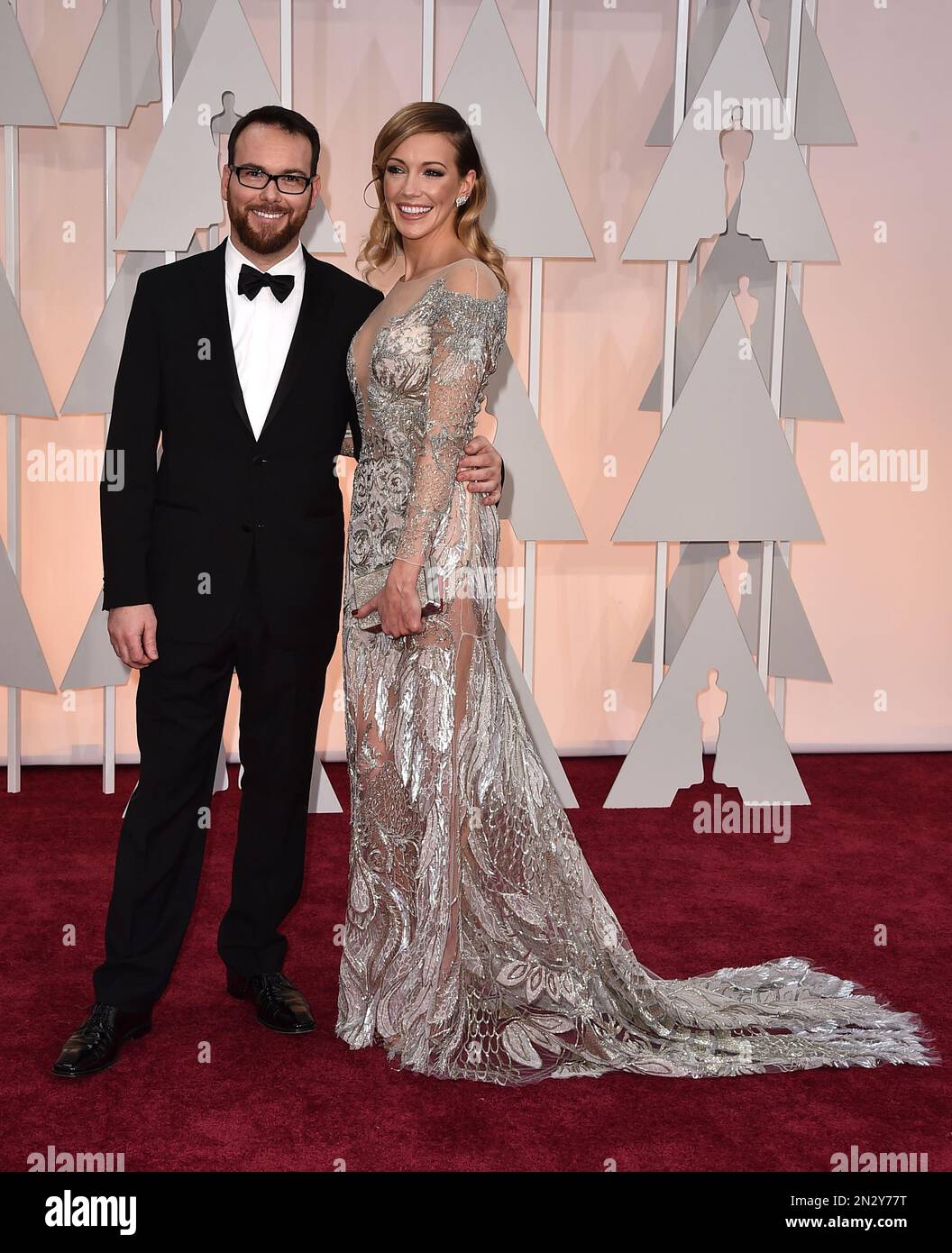 Dana Brunetti, left, and Katie Cassidy arrive at the Oscars on Sunday ...