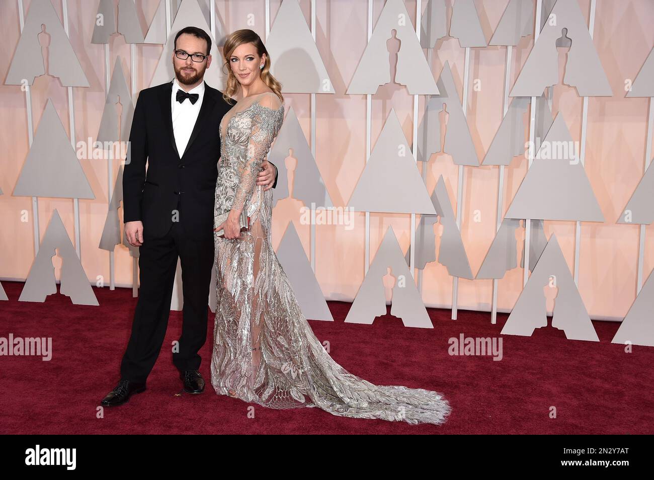Dana Brunetti, left, and Katie Cassidy arrive at the Oscars on Sunday ...