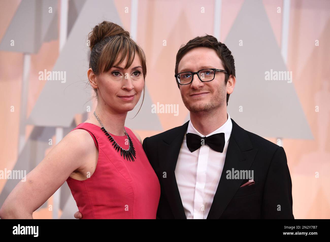 Liz Cackowski, left, and Akiva Schaffer arrive at the Oscars on Sunday ...