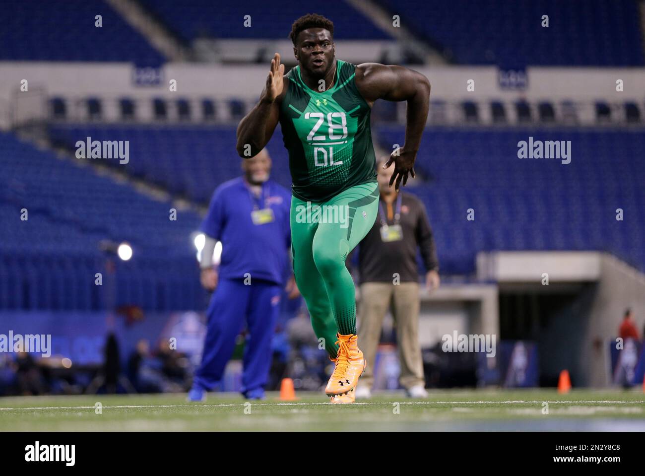 Memphis defensive lineman Martin Ifedi runs a drill at the NFL football ...