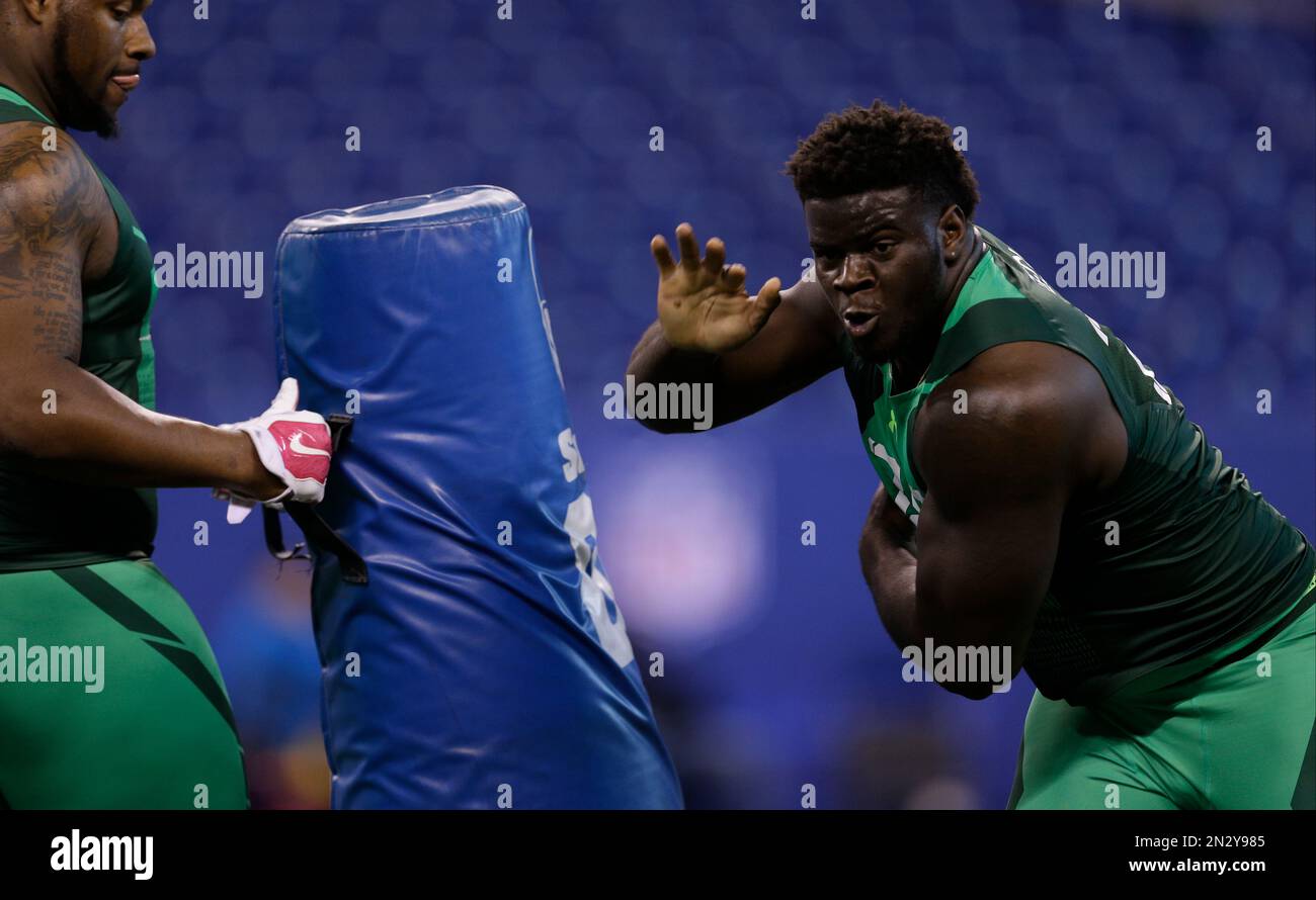 Memphis defensive lineman Martin Ifedi runs a drill at the NFL football ...