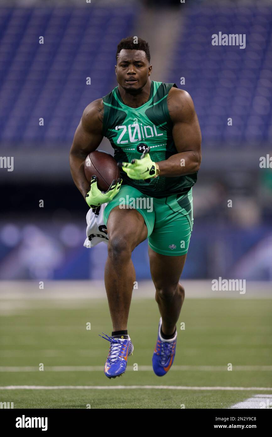 Florida defensive lineman Dante Fowler runs a drill at the NFL football ...