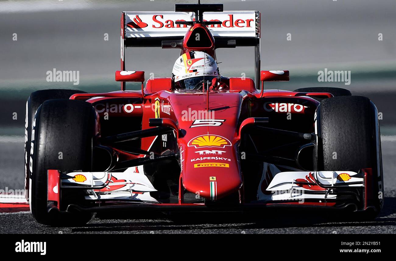 Sebastian Vettel of Germany and Ferrari steers his car during the 2015 ...