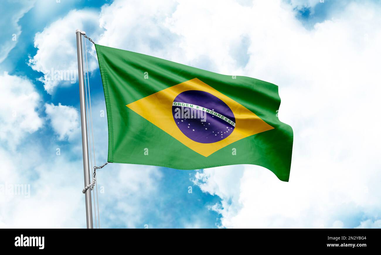 Brazil flag waving on sky background. 3D Rendering Stock Photo - Alamy