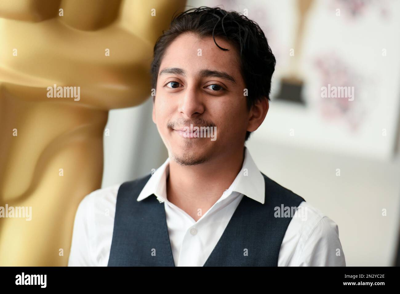 Tony Revolori poses at the 87th Academy Awards - Make Up And ...
