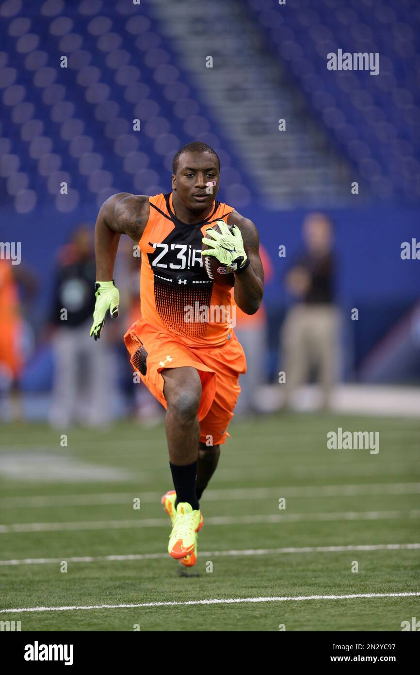Miami running back Duke Johnson runs a drill at the NFL football ...