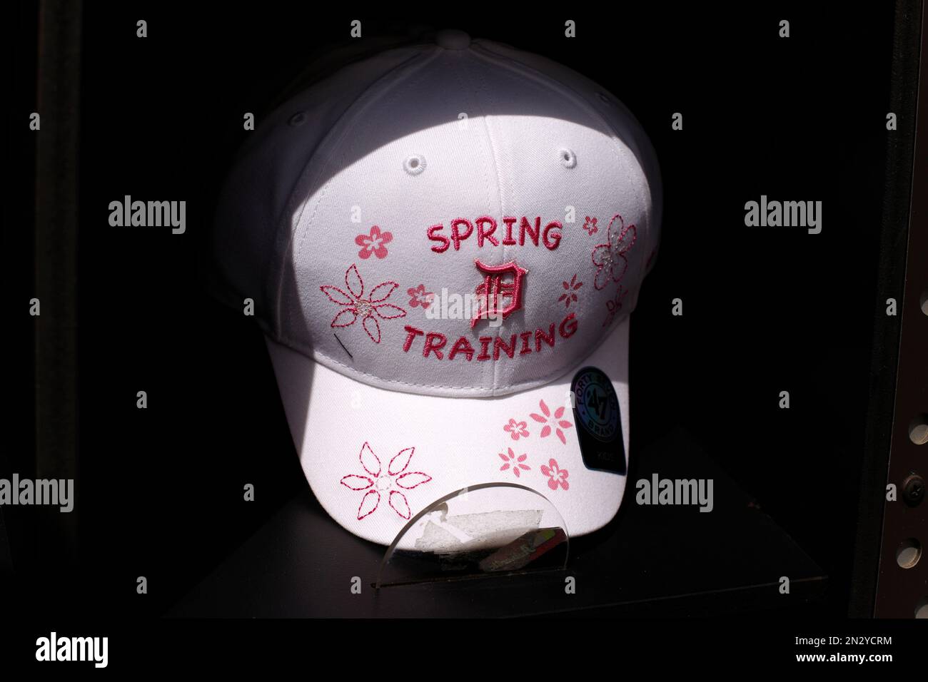 A Detroit Tigers spring training ball cap is on display in a ...