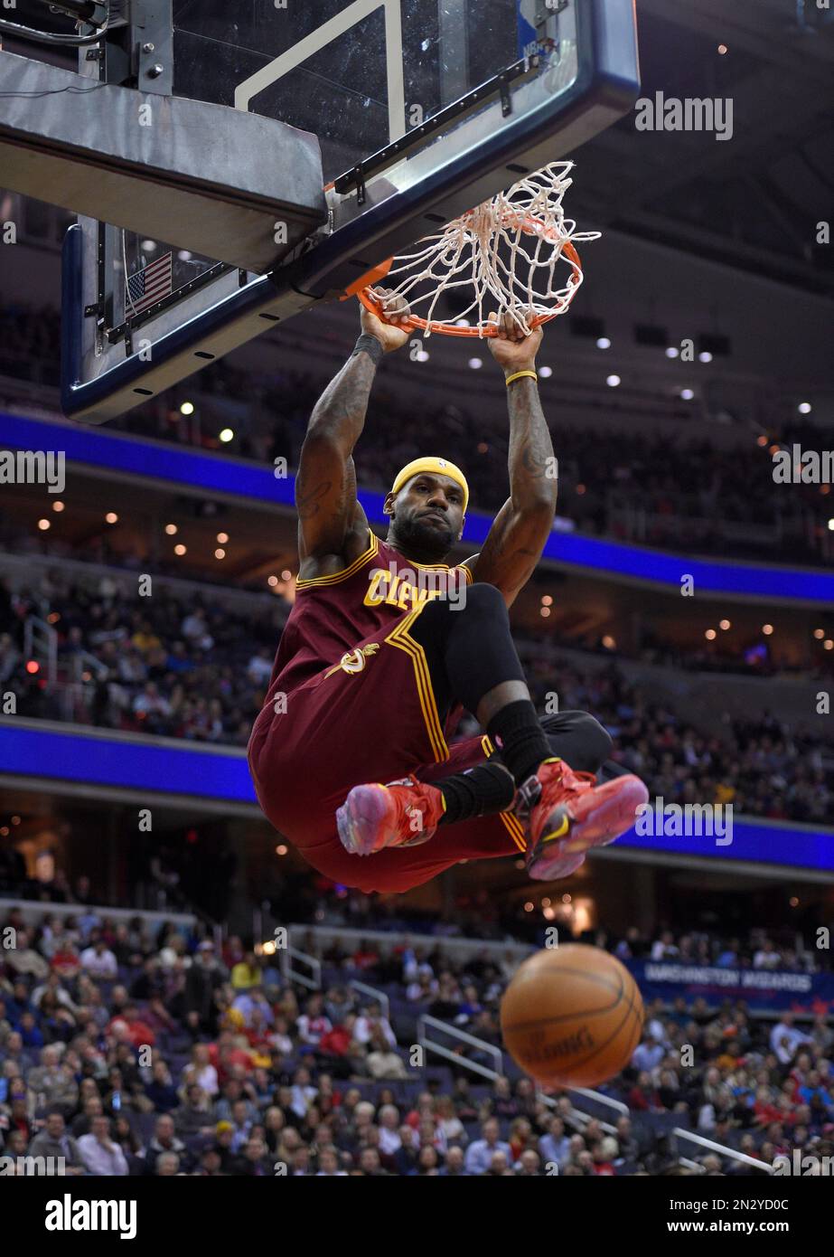 Cleveland Cavaliers forward LeBron James (23) hangs on the rim after ...