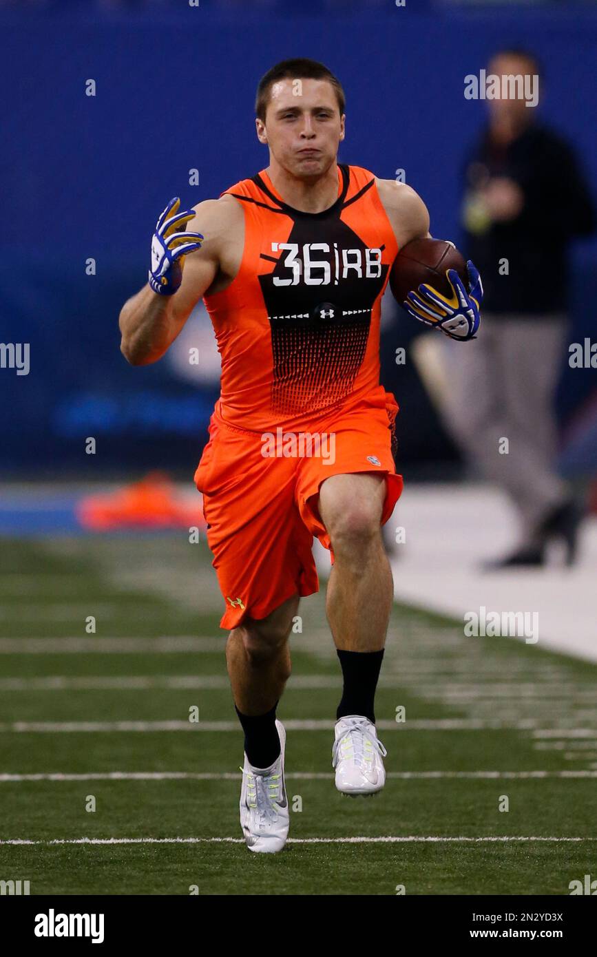 South Dakota State running back Zach Zenner runs a drill at the NFL ...
