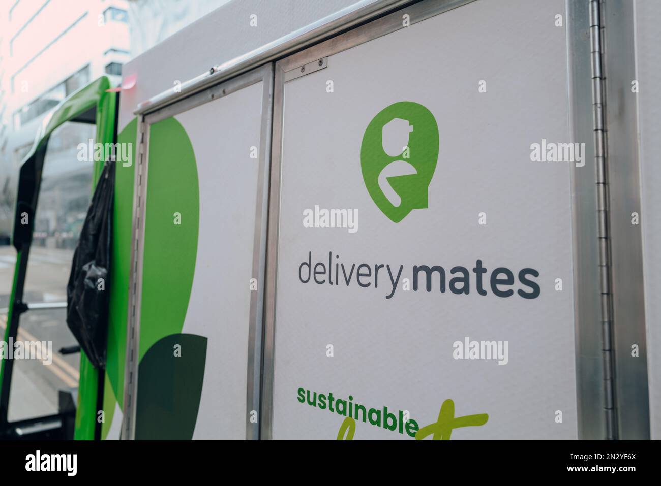 London, UK - February 02, 2023: Close up of the name on Delivery Mates ...
