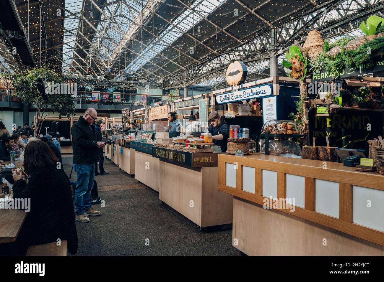 London, UK - February 02, 2023: Row of food market stalls inside ...