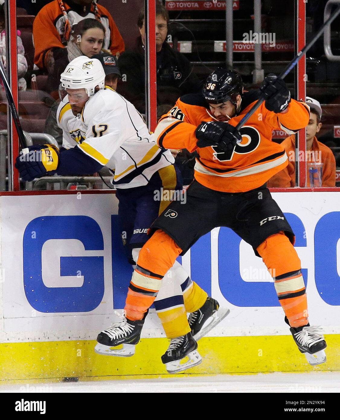 Philadelphia Flyers' Zac Rinaldo, right, collides with Nashville ...