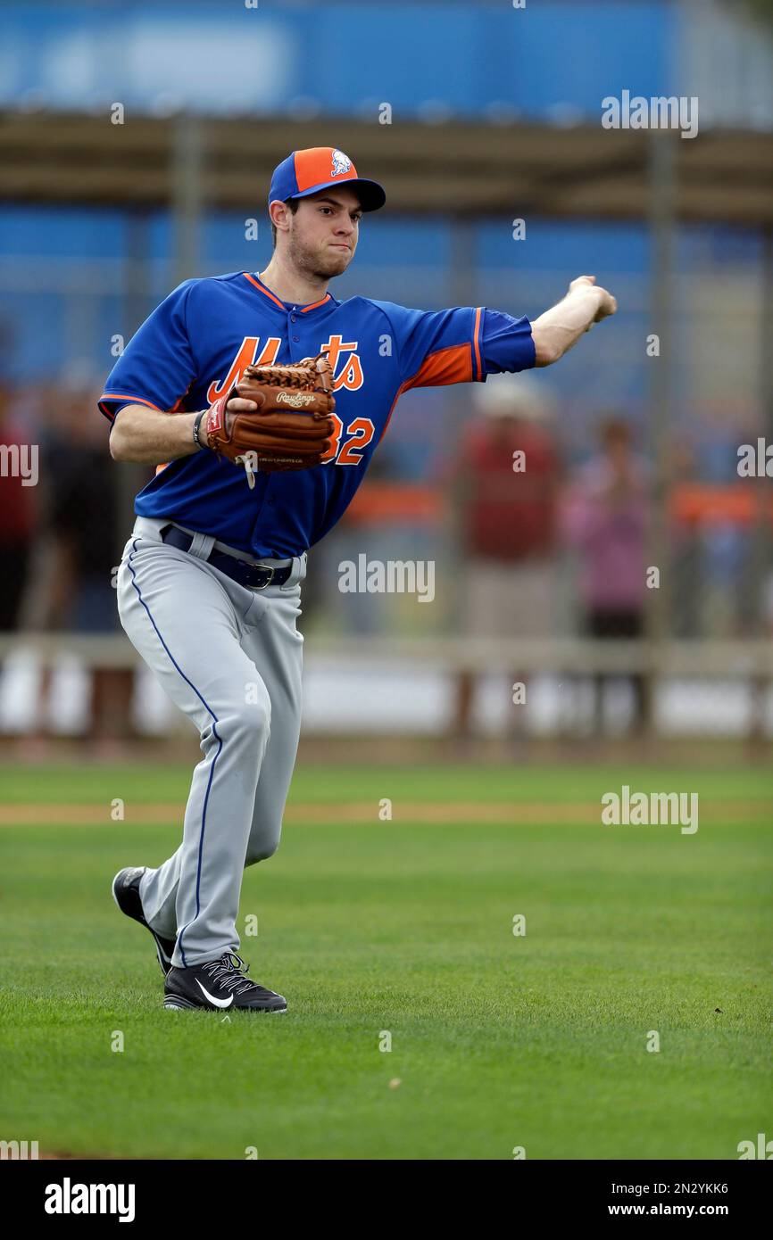 New York Mets pitcher Steven Matz throws to first during spring ...