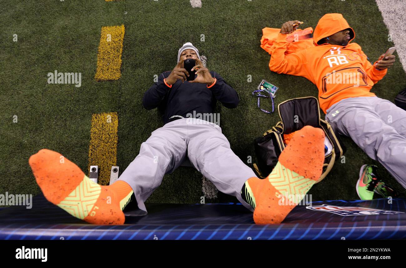 Northern Iowa running back David Johnson puts his feet up as he rests ...