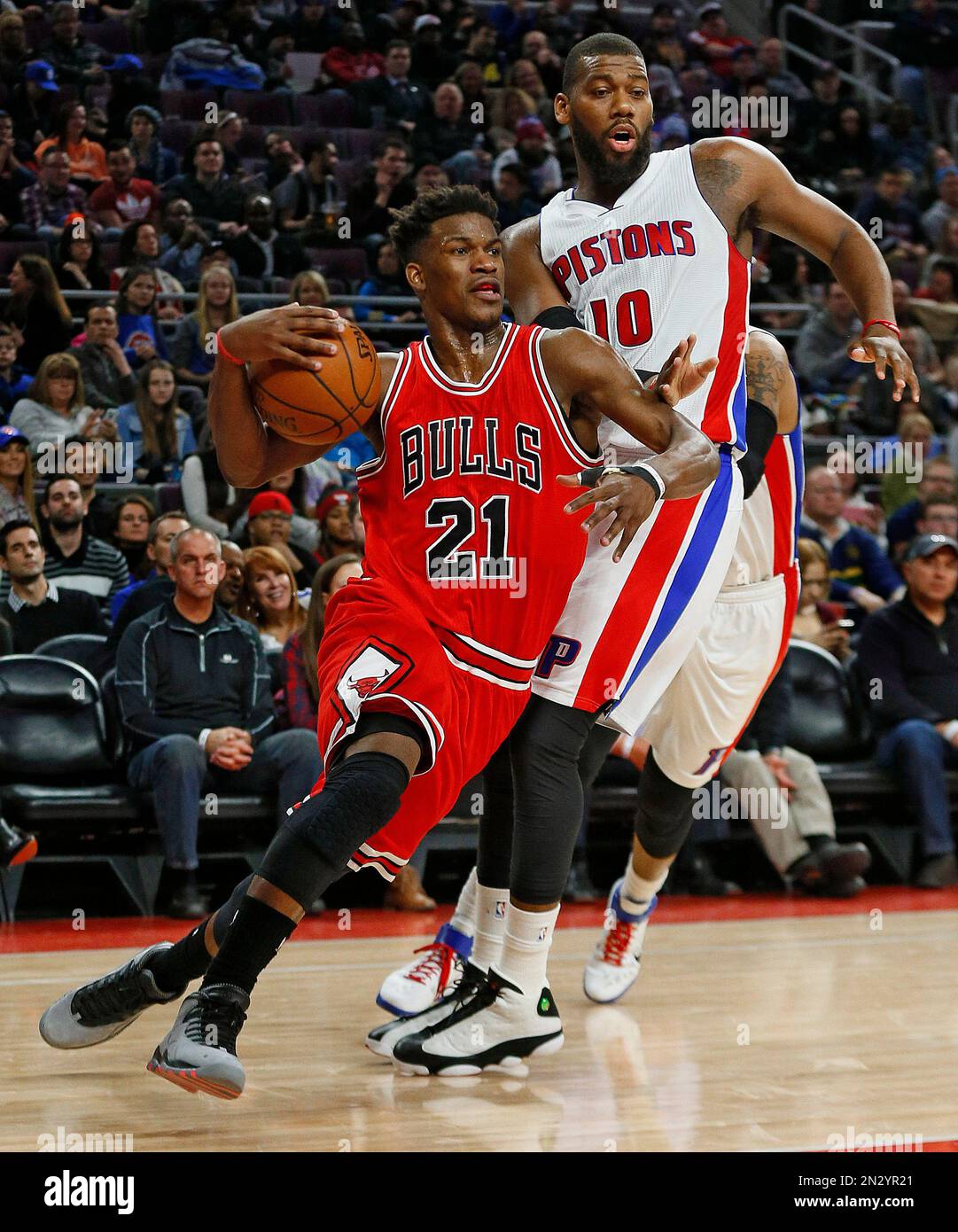 Chicago Bulls guard Jimmy Butler (21) drives on Detroit Pistons forward ... Chicago Bulls guard Jimmy Butler (21) drives on Detroit Pistons forward ...