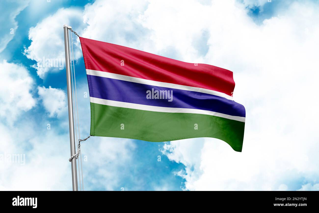 Gambia flag waving on sky background. 3D Rendering Stock Photo - Alamy