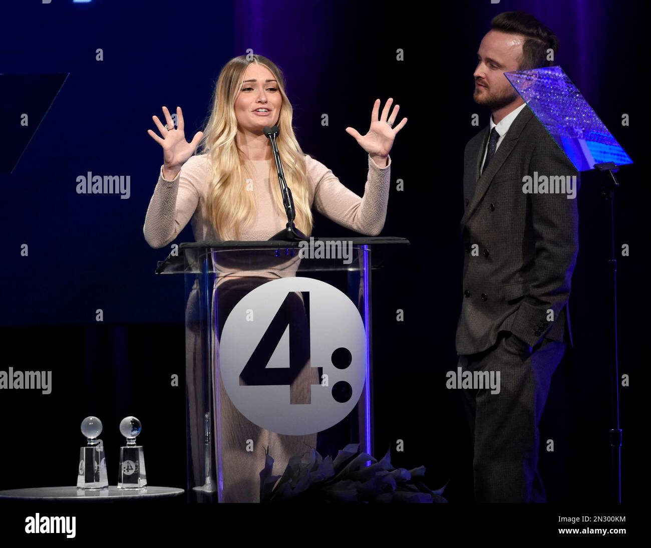 Lauren Paul, left, and Aaron Paul accept the unite2gether award at ...