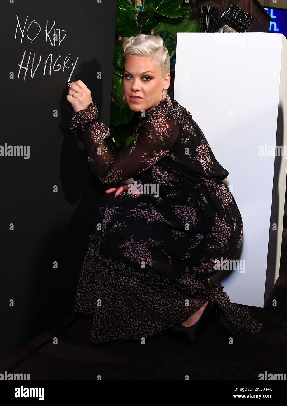 EXCLUSIVE -Pink signs the chalk wall during unite4:good and Variety's ...