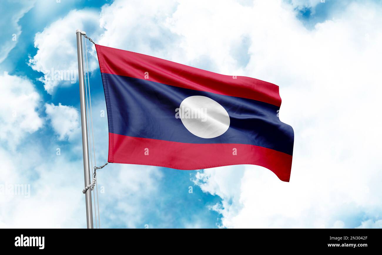 Laos flag waving on sky background. 3D Rendering Stock Photo - Alamy