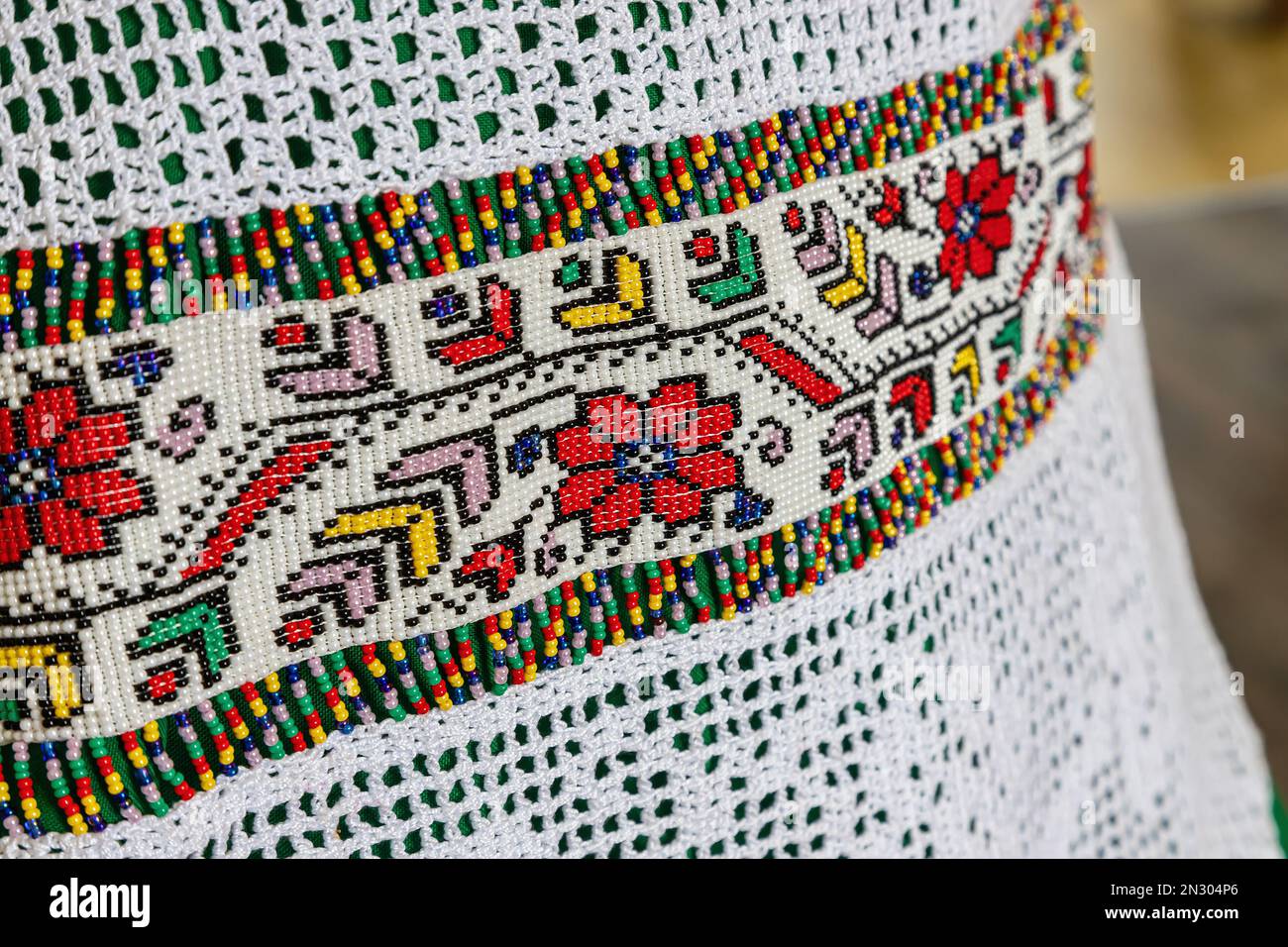 traditional clothes and beaded jewelry. traditional ornaments and ...